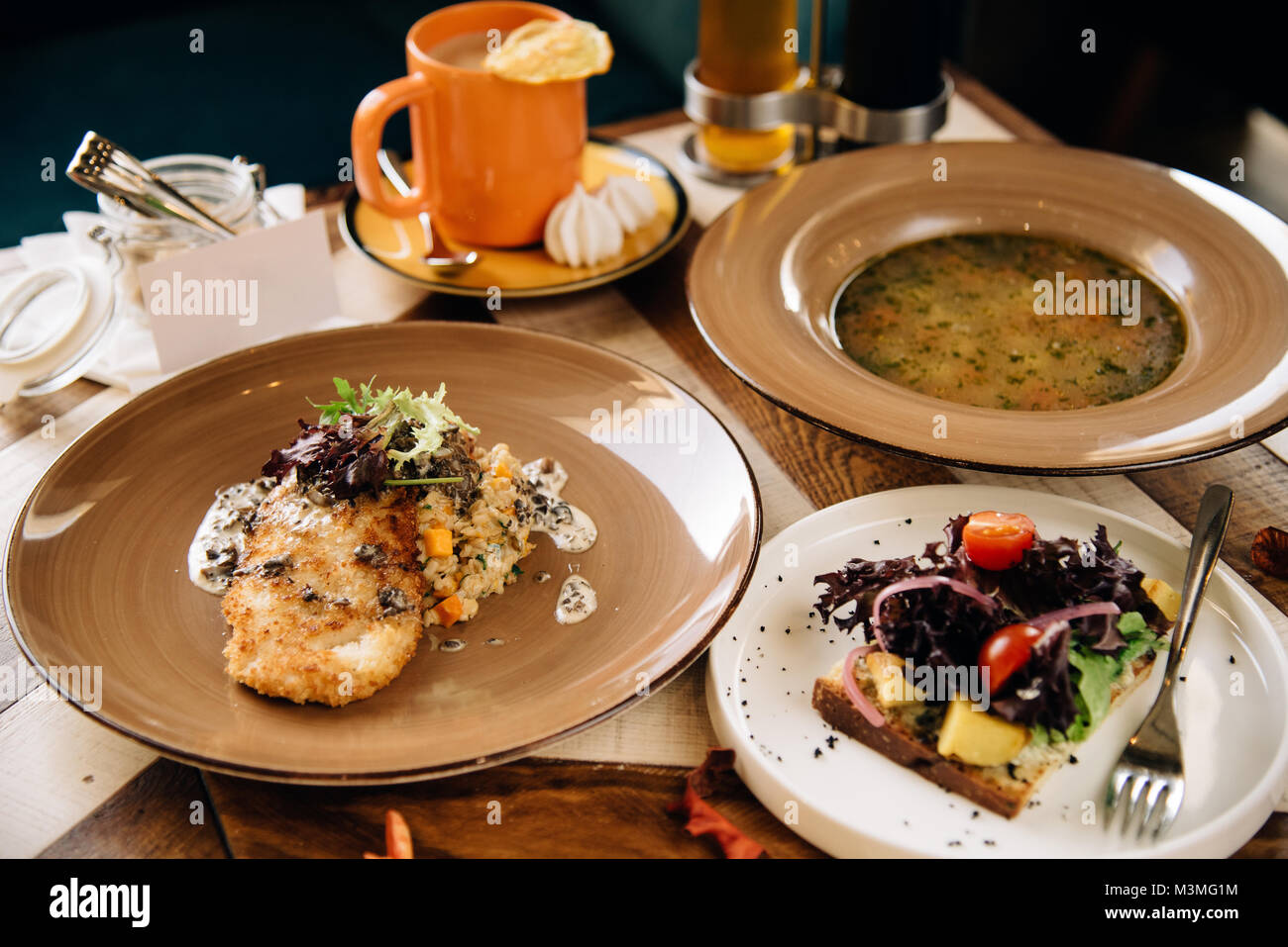 Chef's specialty presented in restaurant on served table Stock Photo ...