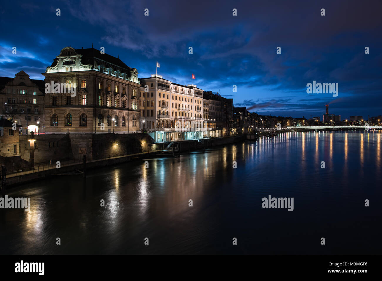 Basel switzerland at night, view from middle bridge to the historical ...