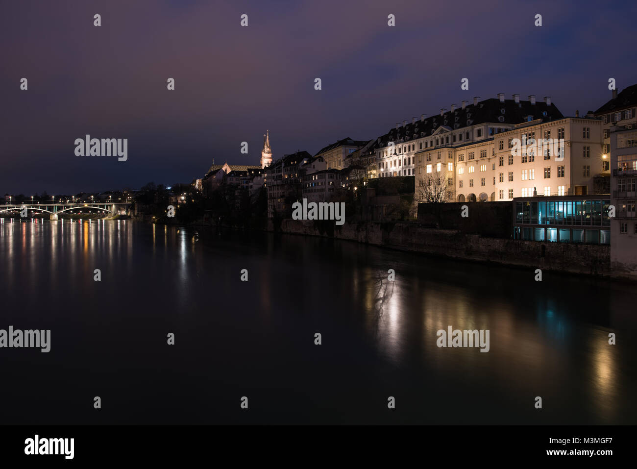 Basel switzerland at night, view from middle bridge to the historical ...