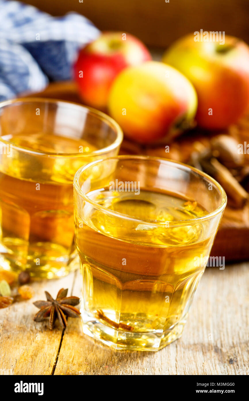 Hot cider with spices in glasses Stock Photo - Alamy