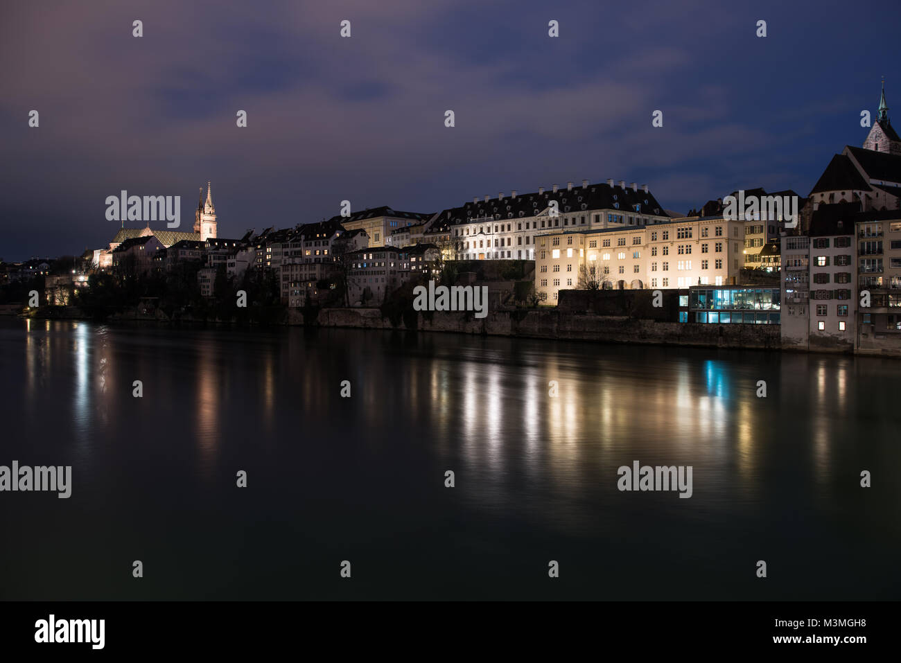 Basel switzerland at night, view from middle bridge to the historical ...