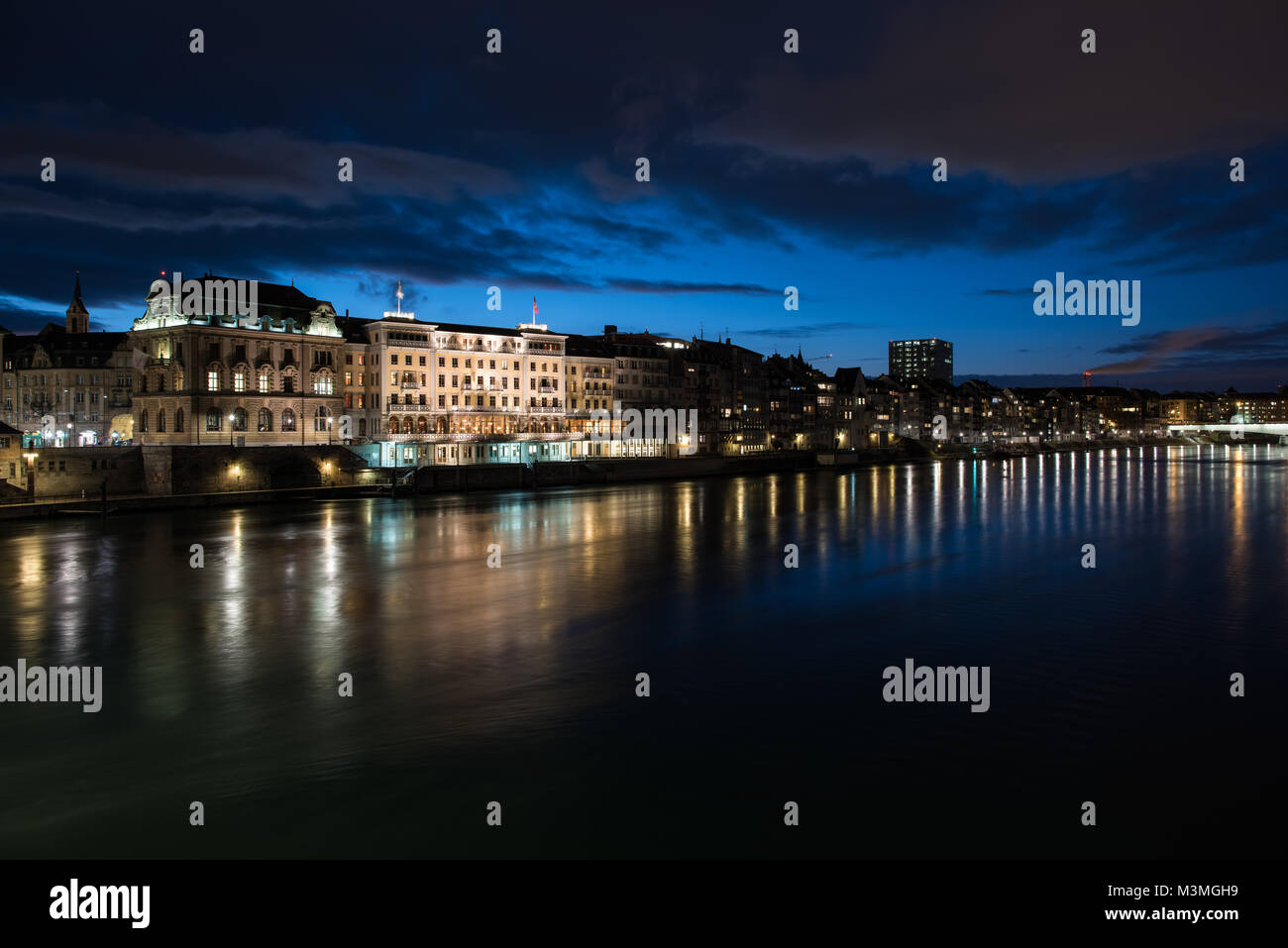 Basel switzerland at night, view from middle bridge to the historical ...