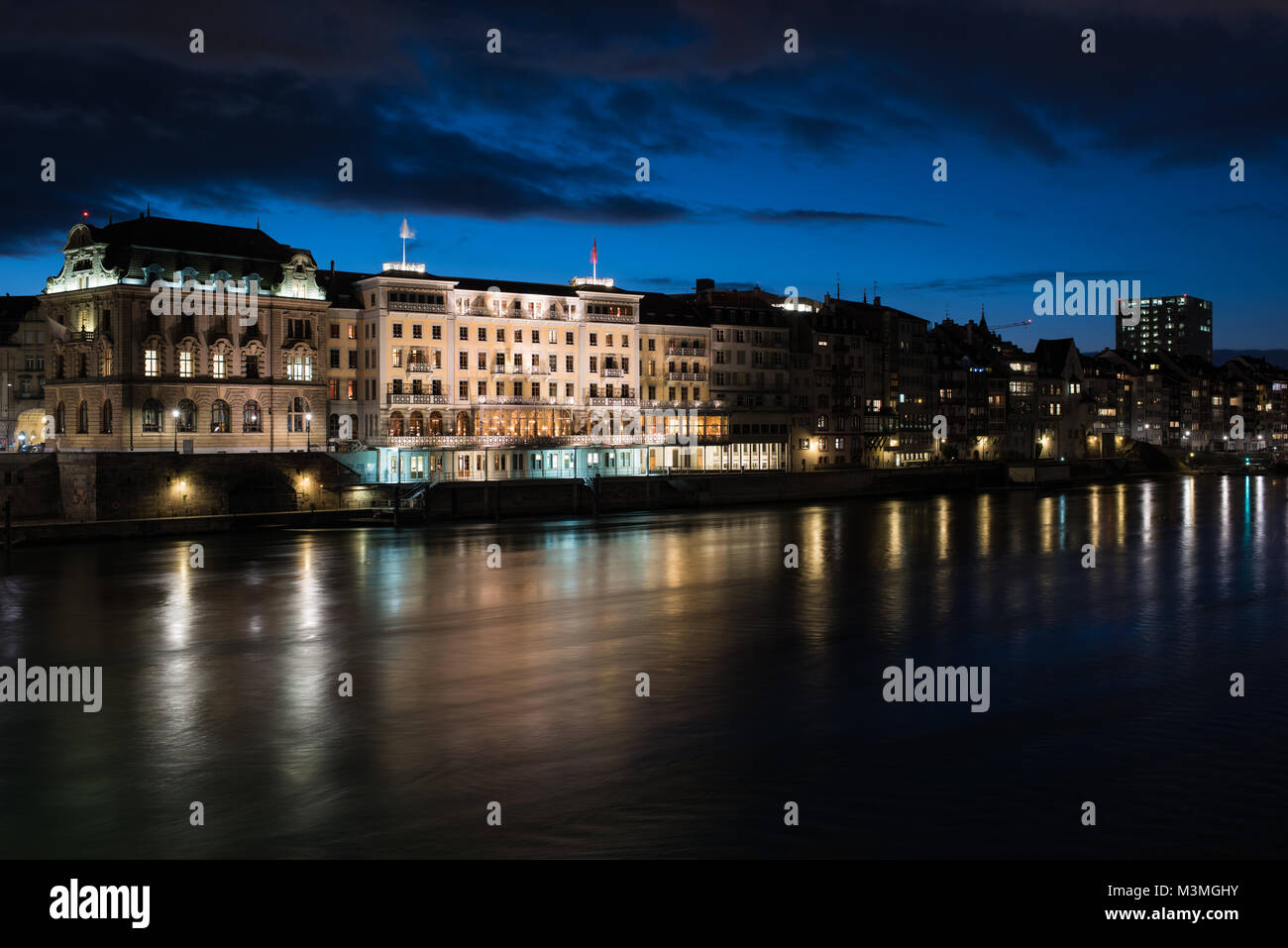 Basel switzerland at night, view from middle bridge to the historical ...