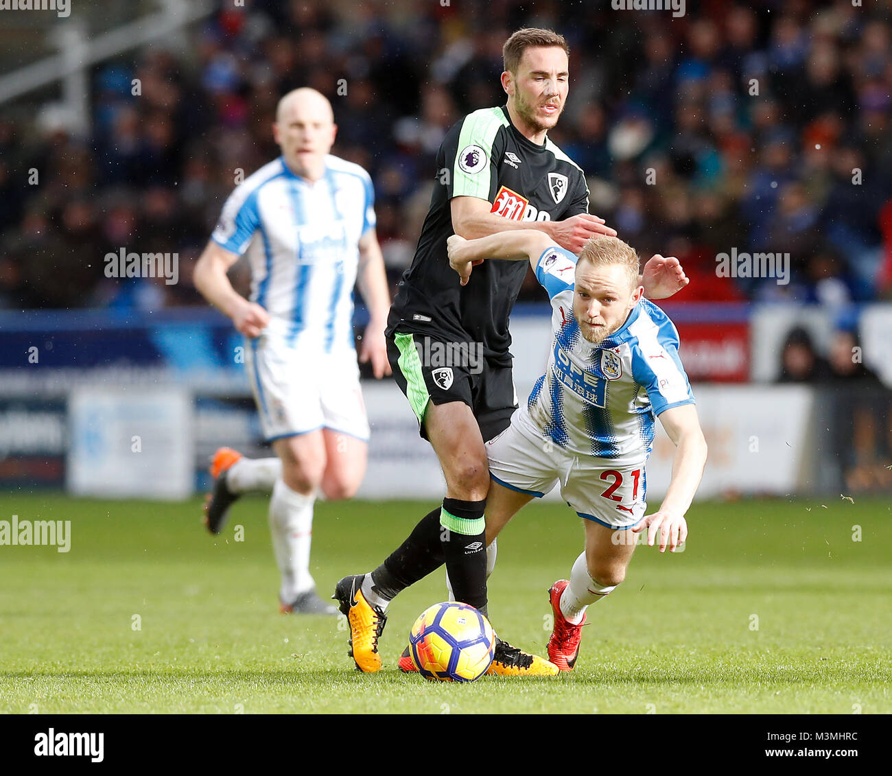Huddersfield Town's Alex Pritchard battles for the ball during the ...
