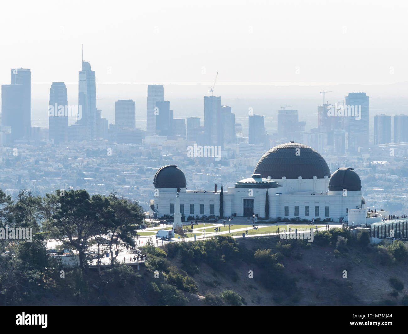 Aerial view of Griffith Observatory and Los Angeles downtown in a sunny ...