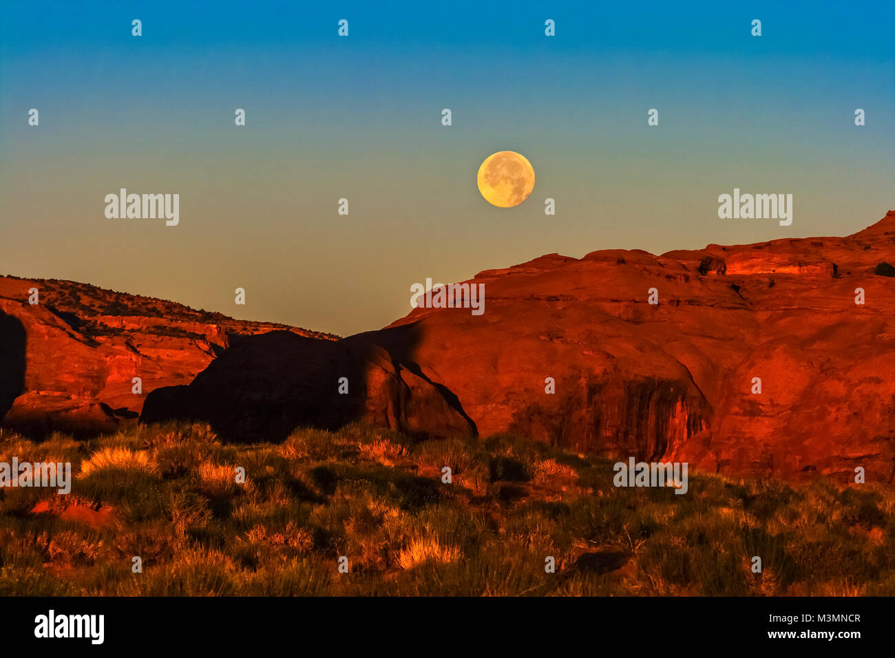 Gorgeous moonset during sunrise in Monument Valley Navajo Tribal Park ...