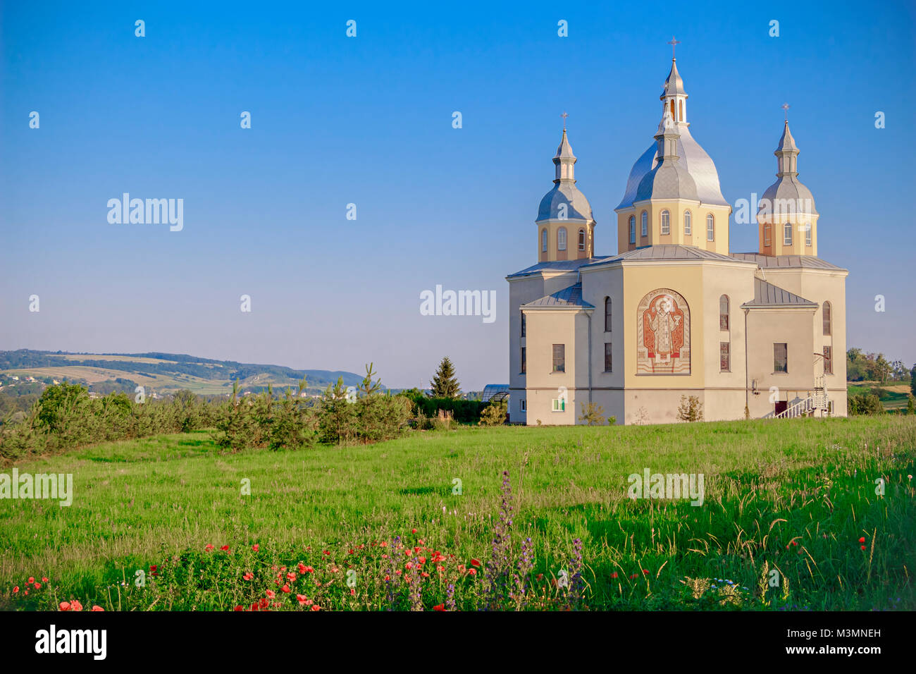Holy temple of the Archangel Michael in the countryside by the road ...