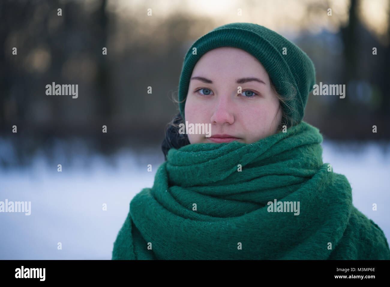 Portrait of teen girl walking in town in cold winter day Stock Photo ...
