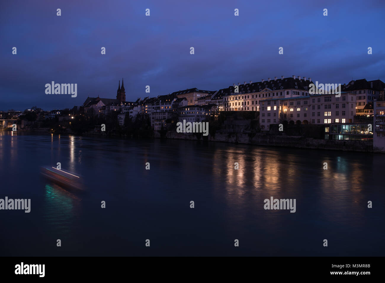 Basel switzerland at night, view from middle bridge to the historical ...