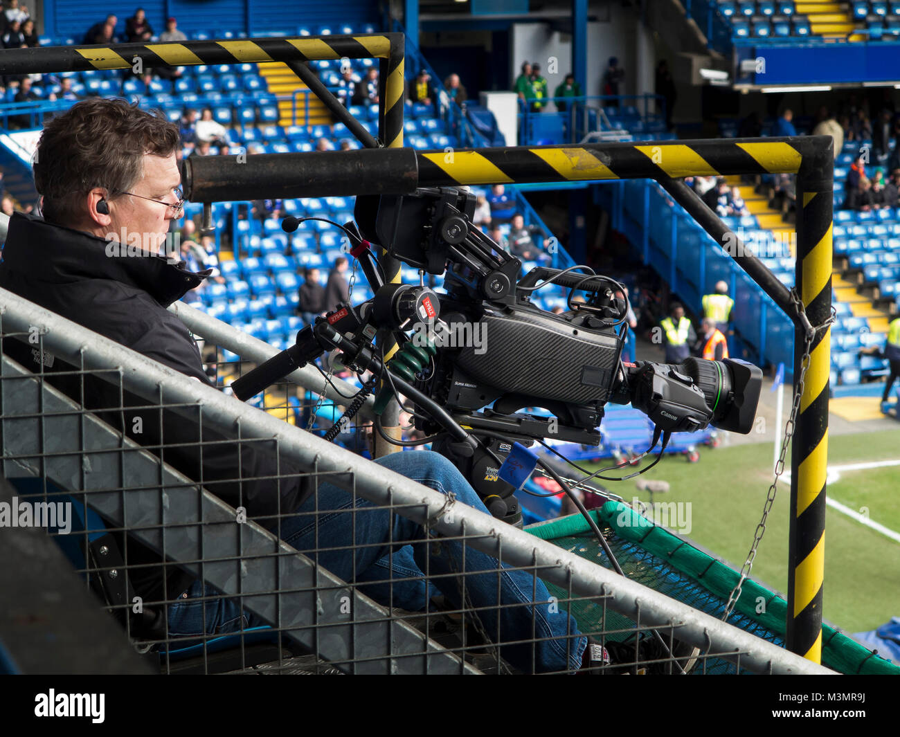 TV camera shooting scenes at soccer match Stock Photo - Alamy