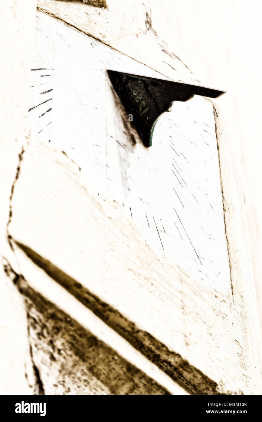 and the gnomon in the antique broken wall Stock Photo - Alamy
