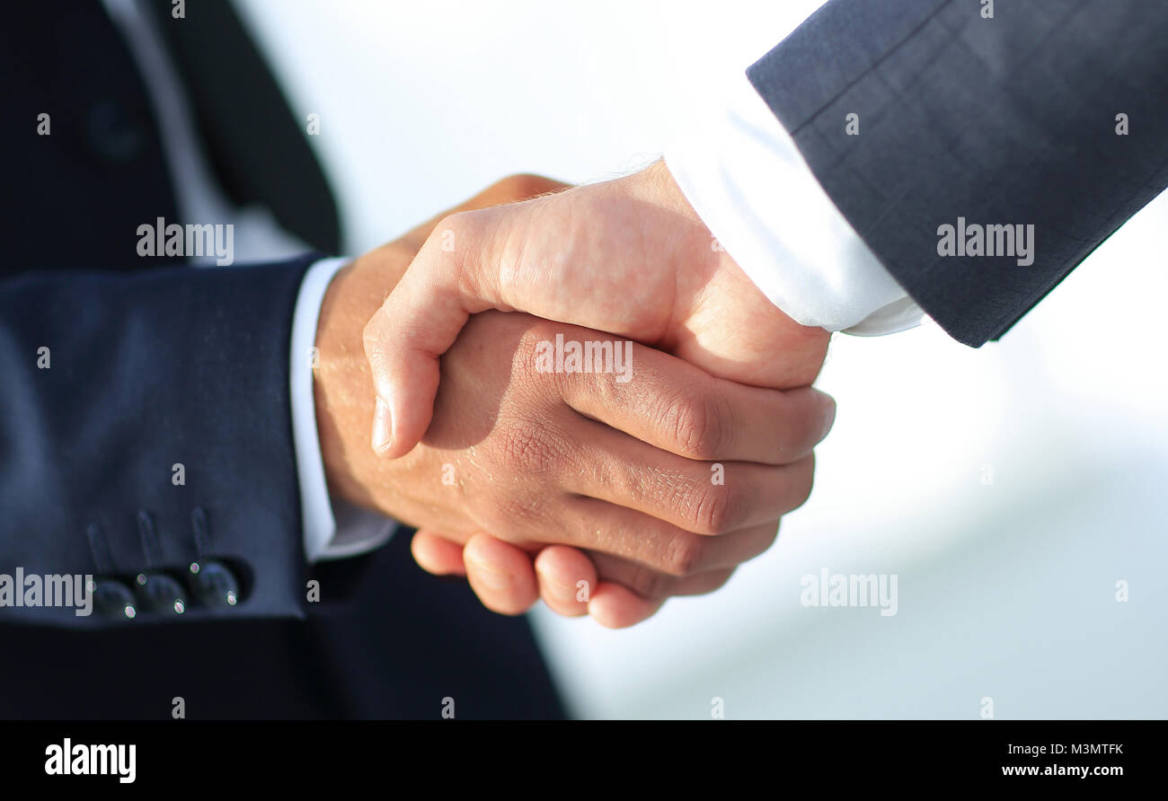 Business men giving a handshake. Business concept Stock Photo - Alamy