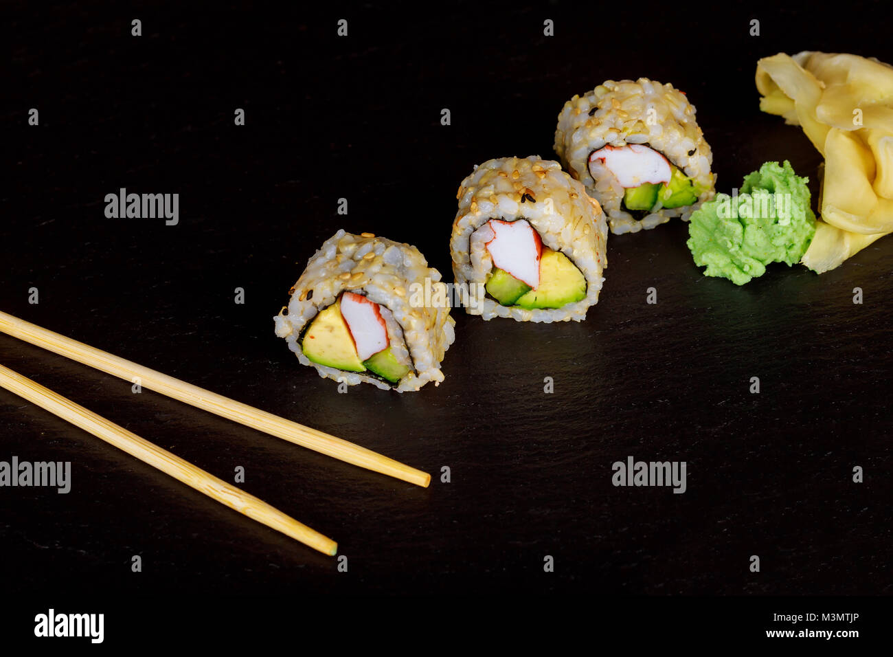 Sushi roll sushi with prawn, avocado, cream cheese, sesame. Sushi menu ...