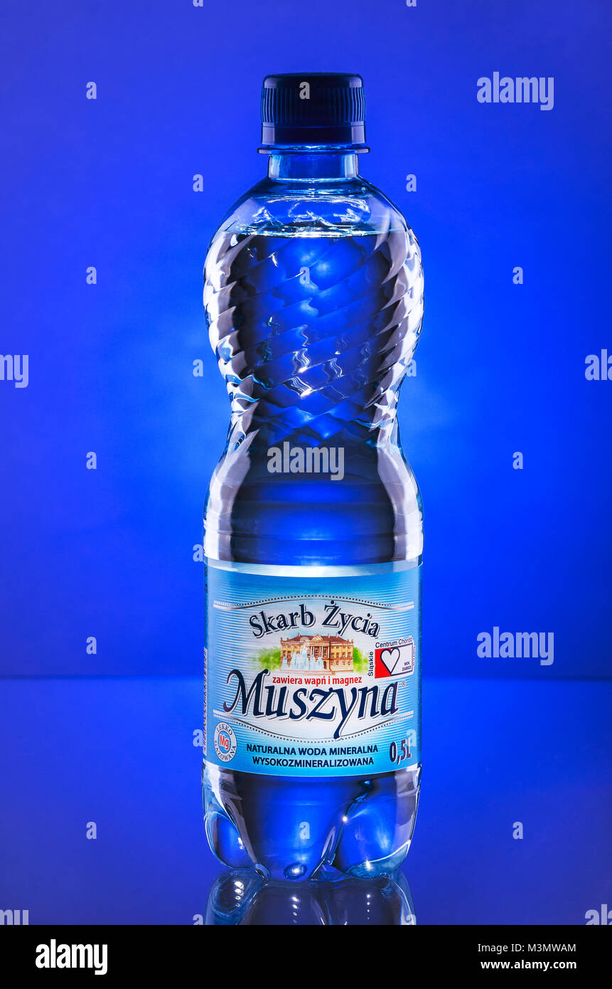 Muszyna mineral water on gradient background Stock Photo - Alamy
