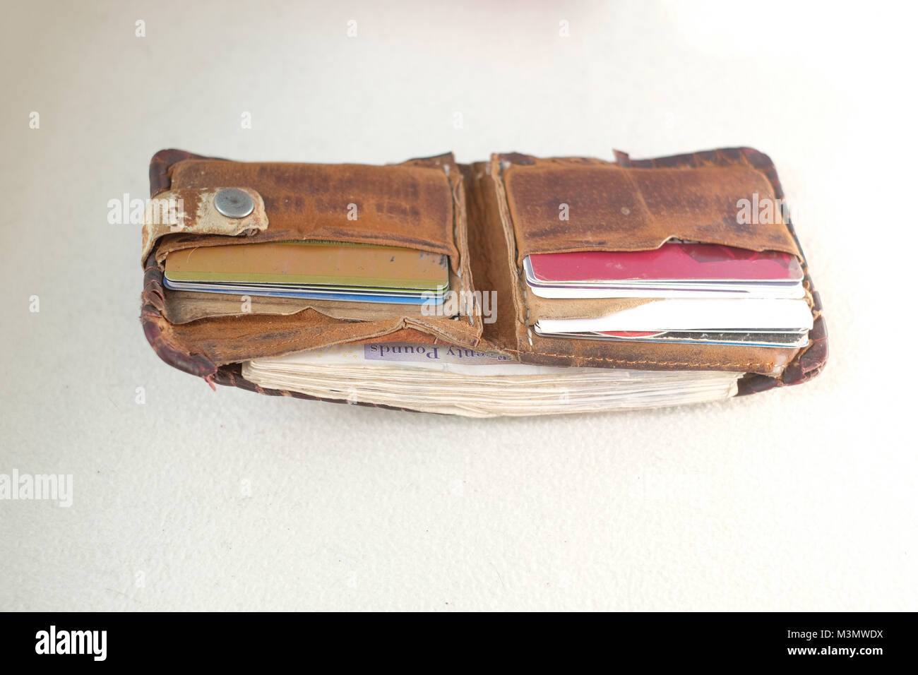 February 2018 - Old leather wallet stuffed with British cash, so it can ...