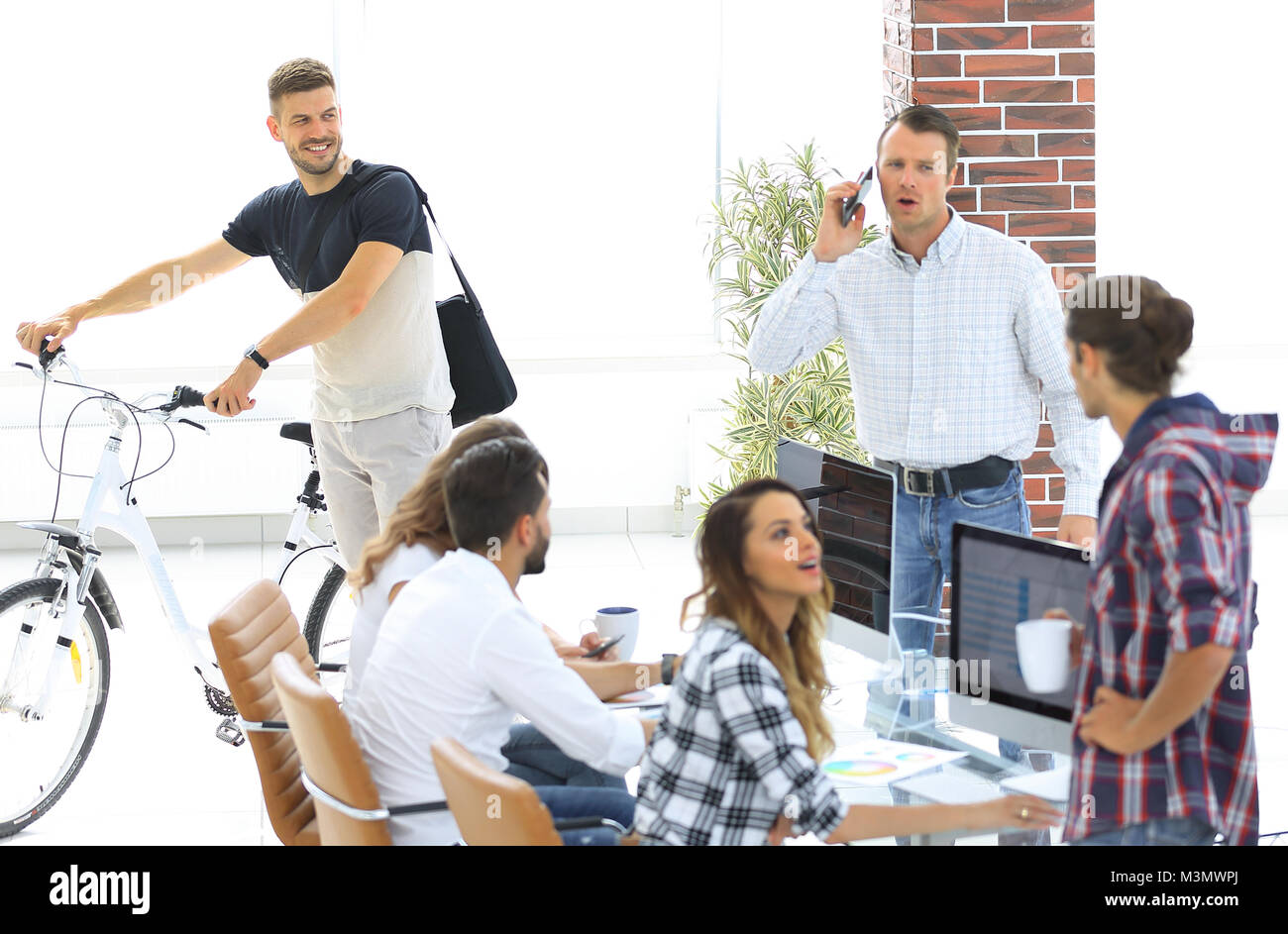 creative team working in a modern office Stock Photo - Alamy