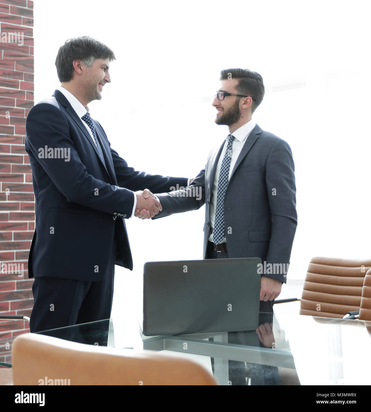 Meeting business partners in the office Stock Photo - Alamy