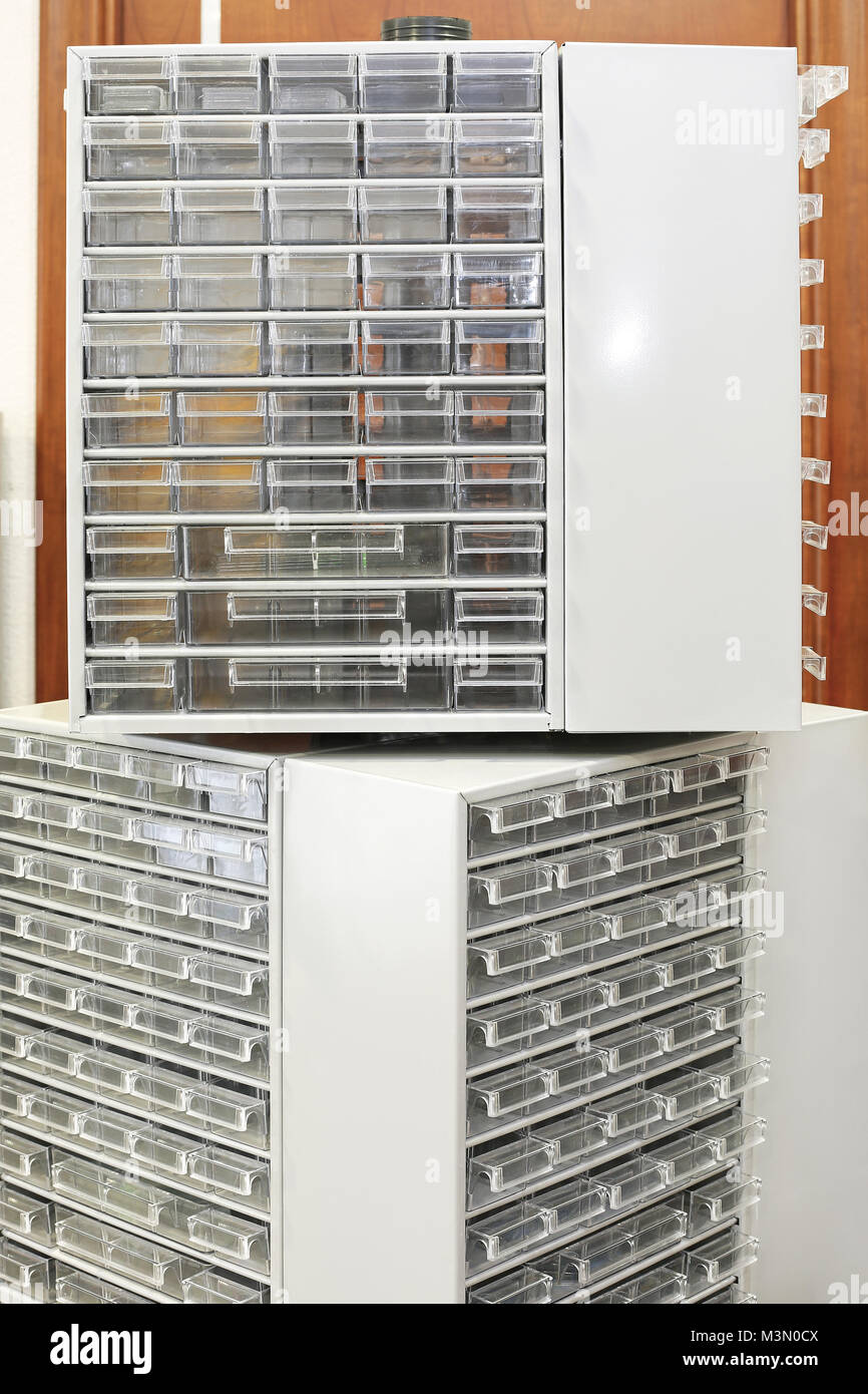 Small Transparent Drawers for Parts in Workshop Stock Photo - Alamy