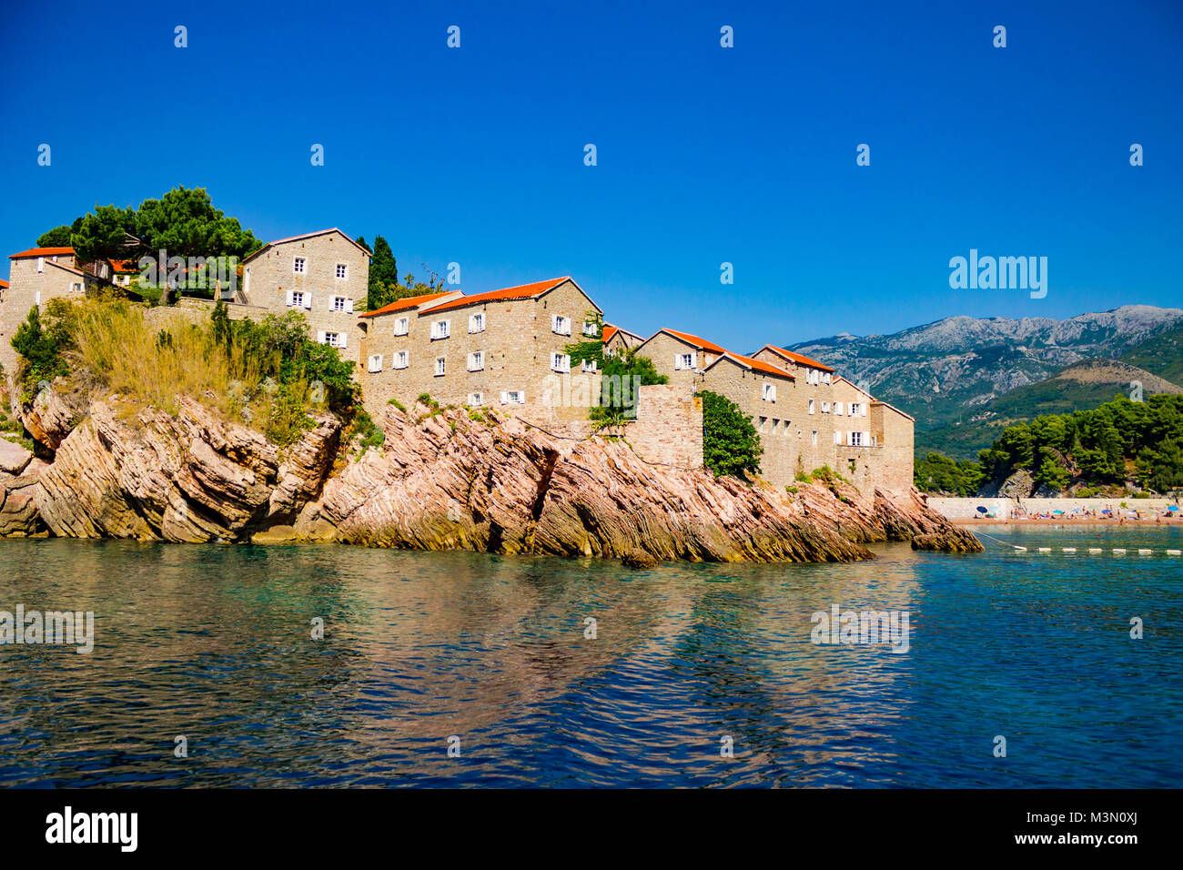Wonderful old Balkan stone buildings in water Stock Photo - Alamy