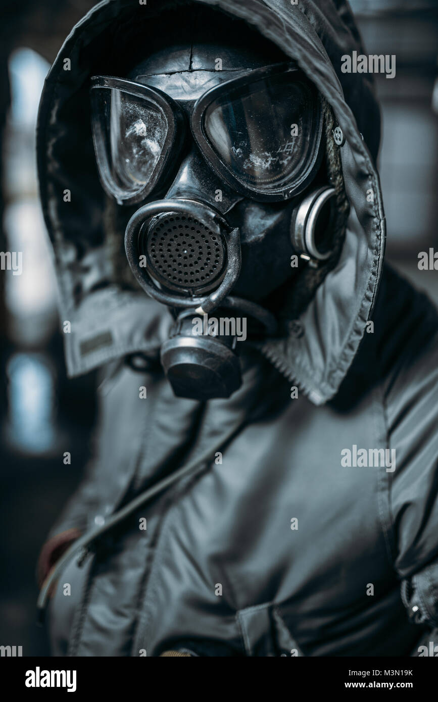 Stalker concept, male person in gas mask, radiation danger. Post ...