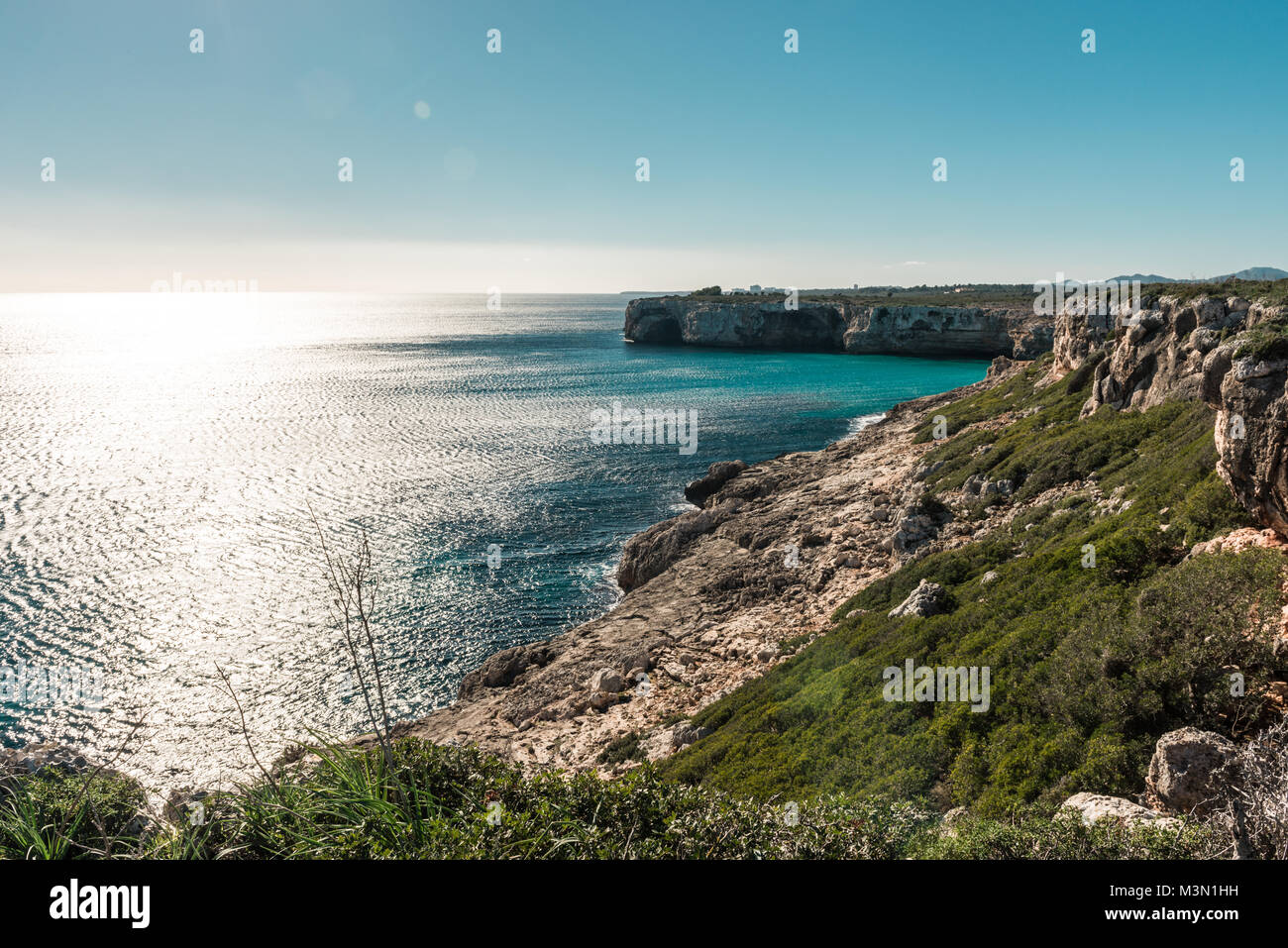 Cliffs, capes and coves of the mediterranean sea near Cala Falco on the ...