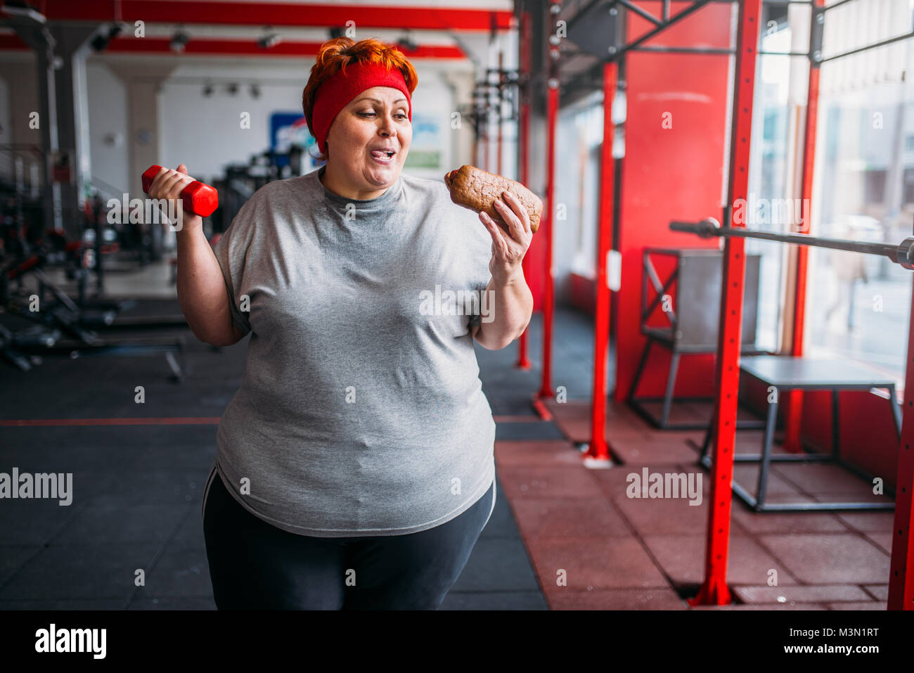 Fat woman with fast food and dumbbell in hands, motivation, hard ...
