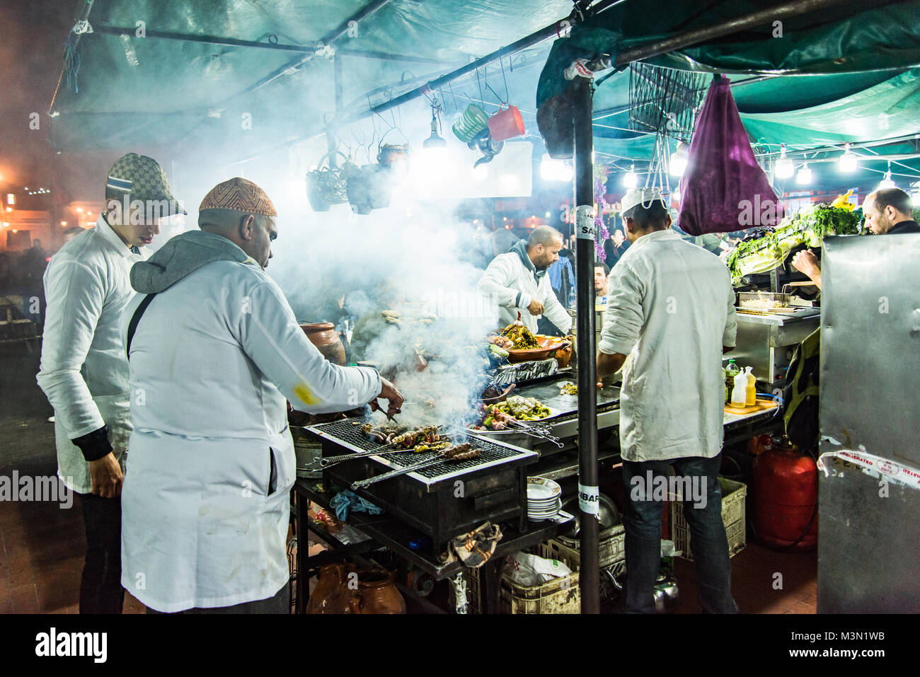 Marrakech,Morocco - January 2018: Moroccan chef cooking fresh bbq over ...