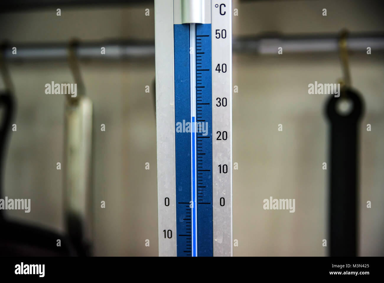 Close up blue vertical thermometer used in kitchen Stock Photo - Alamy