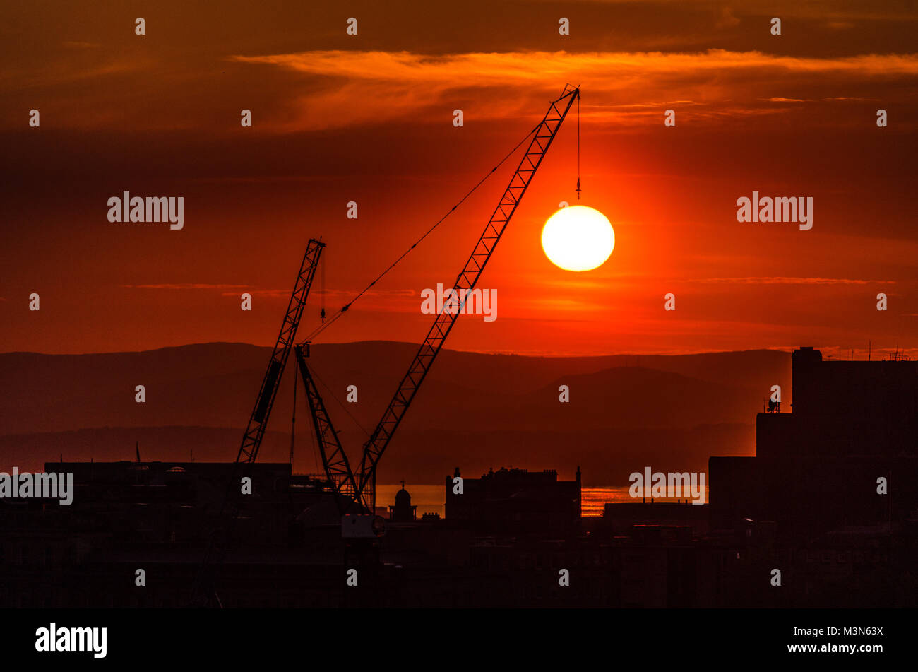 Sun hanging by the crane hi-res stock photography and images - Alamy
