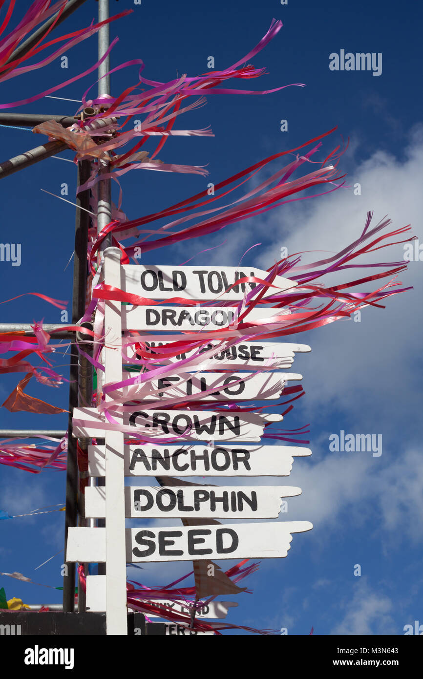 Signs for restaurants during Fat Tuesday celebrations in Hastings, East ...