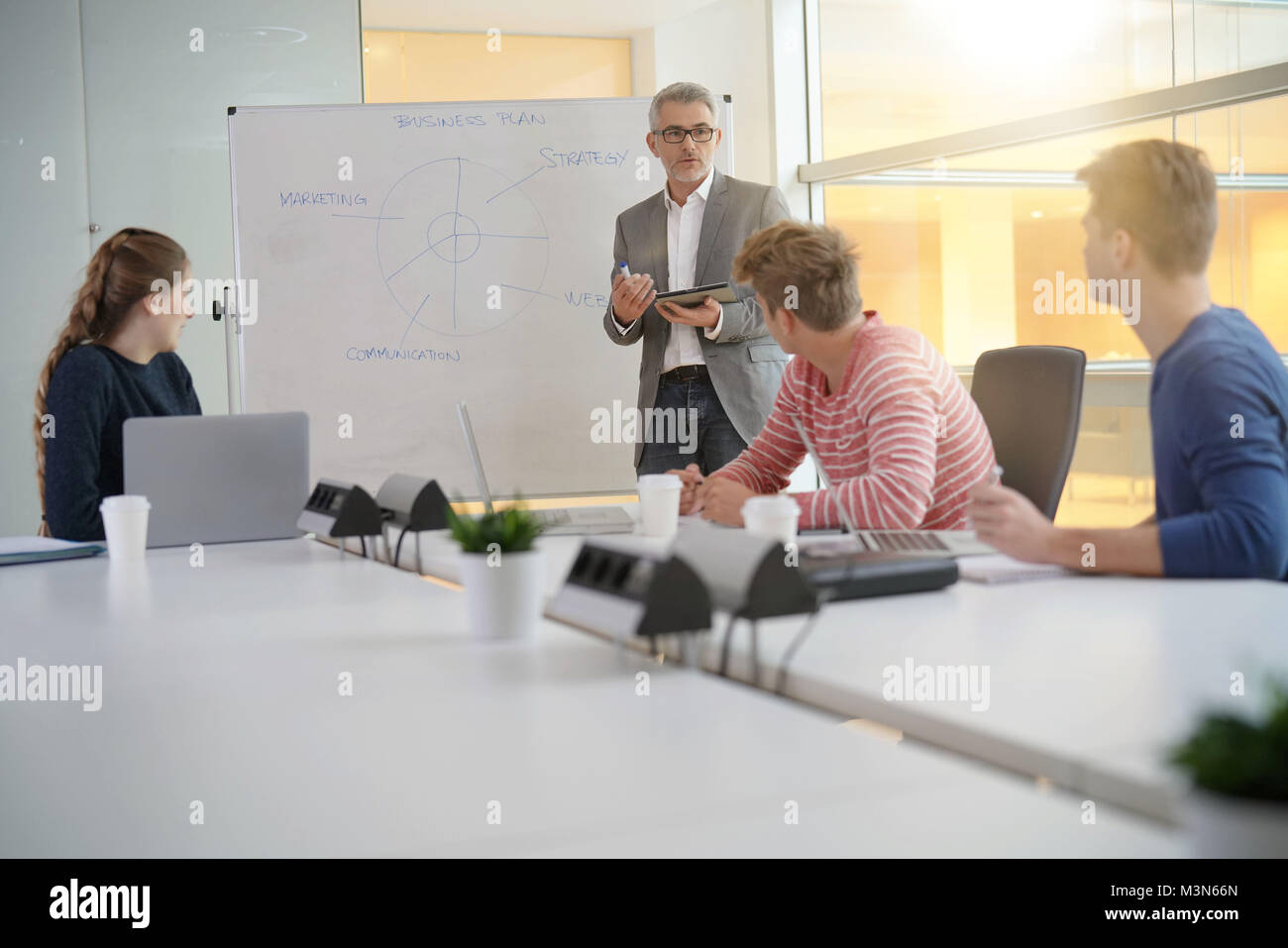 Economics teacher hi-res stock photography and images - Alamy