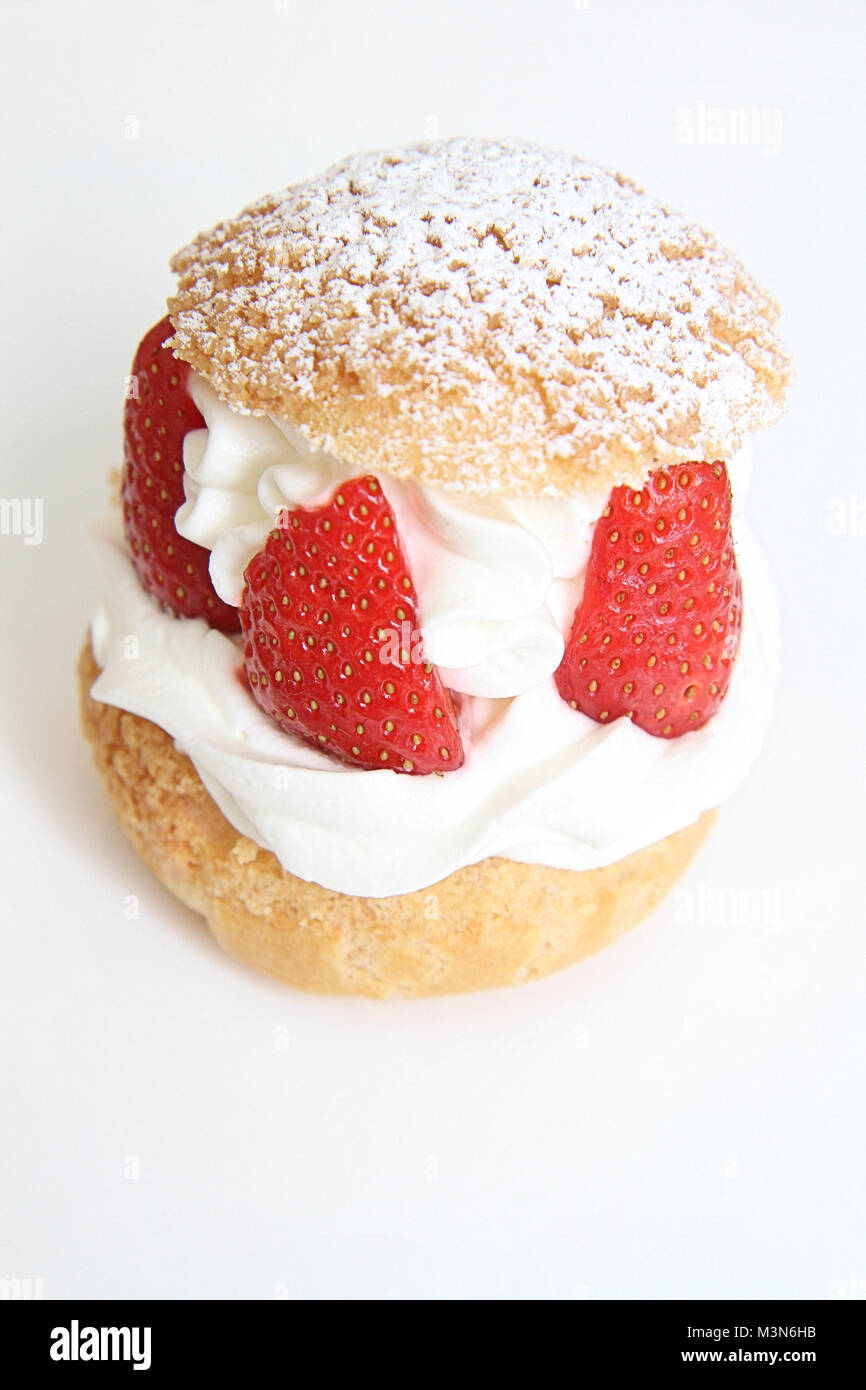Whipped cream and strawberries puffs Stock Photo - Alamy