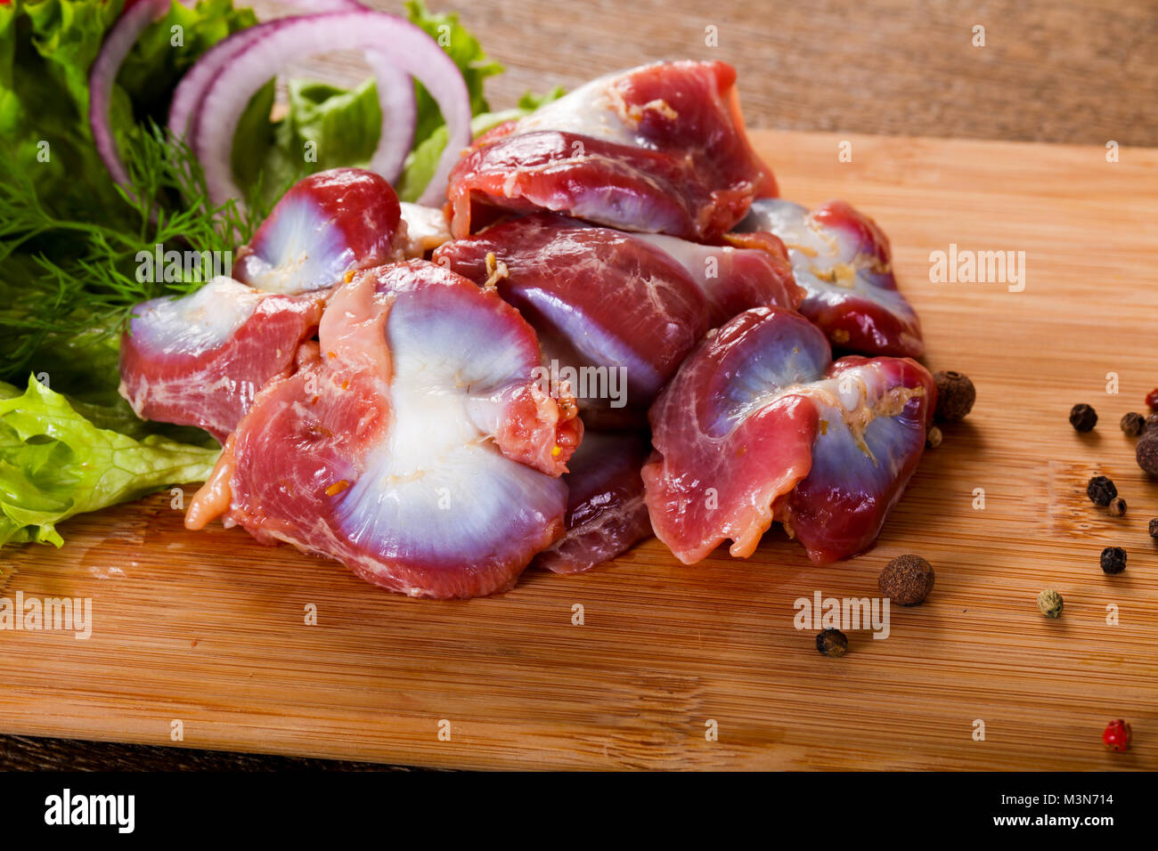 Raw chicken giblets gizzards hi-res stock photography and images - Alamy