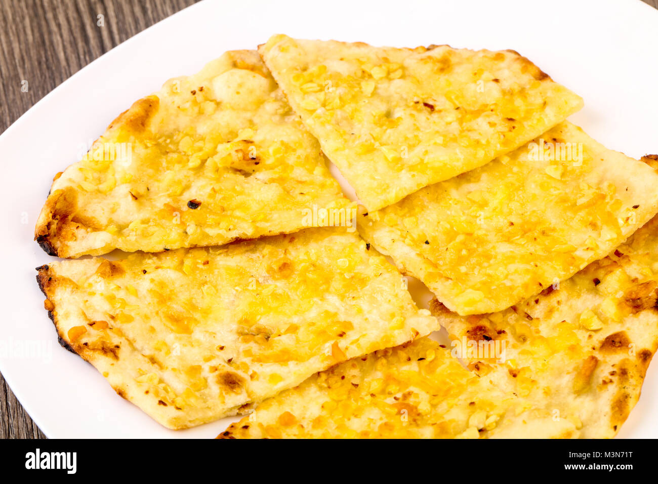 Indian bread - Naan with cheese and garlic Stock Photo - Alamy