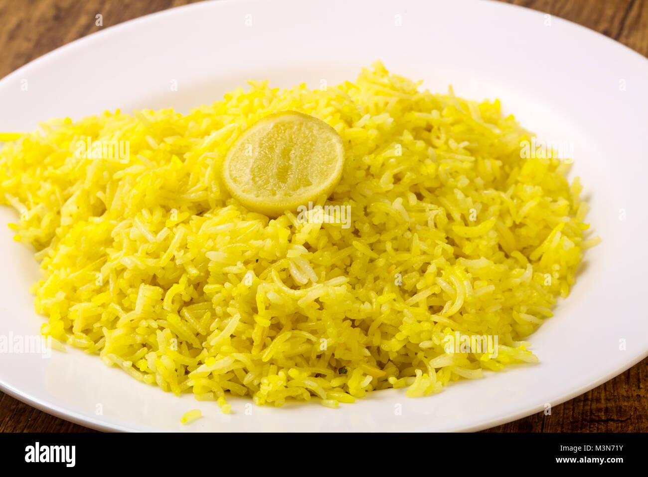Indian traditional cuisine - Yellow Rice with Lime Stock Photo - Alamy