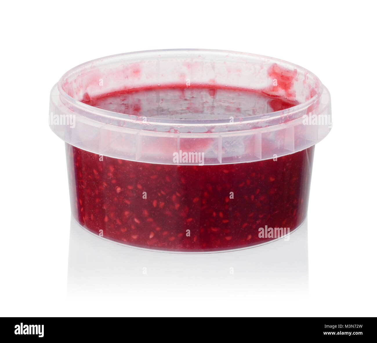 Raspberry jam in plastic bowl isolated on white background Stock Photo ...
