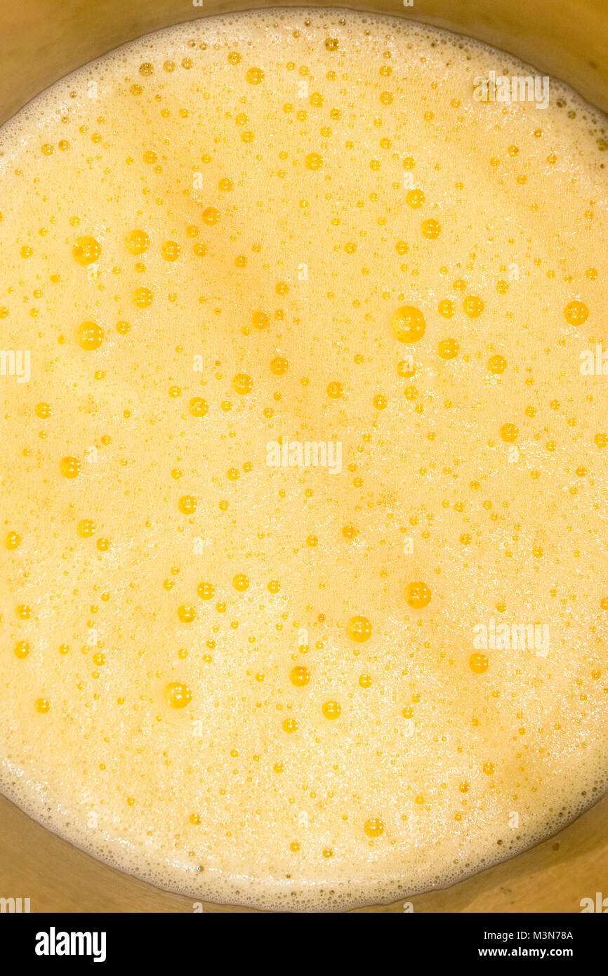 Foam. Whipped eggs in a bowl Stock Photo - Alamy