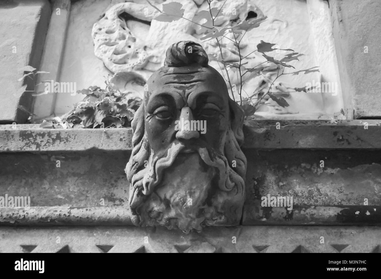 Statue of a Bearded Man in a Cemetery Stock Photo - Alamy