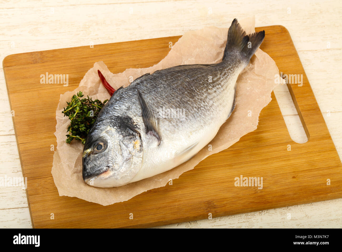 raw dorada fish - ready for cooking Stock Photo - Alamy