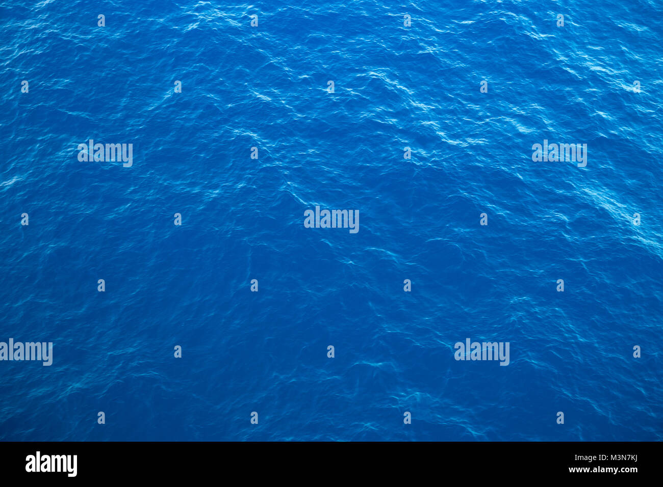 Calm ocean surface with small waves Stock Photo - Alamy