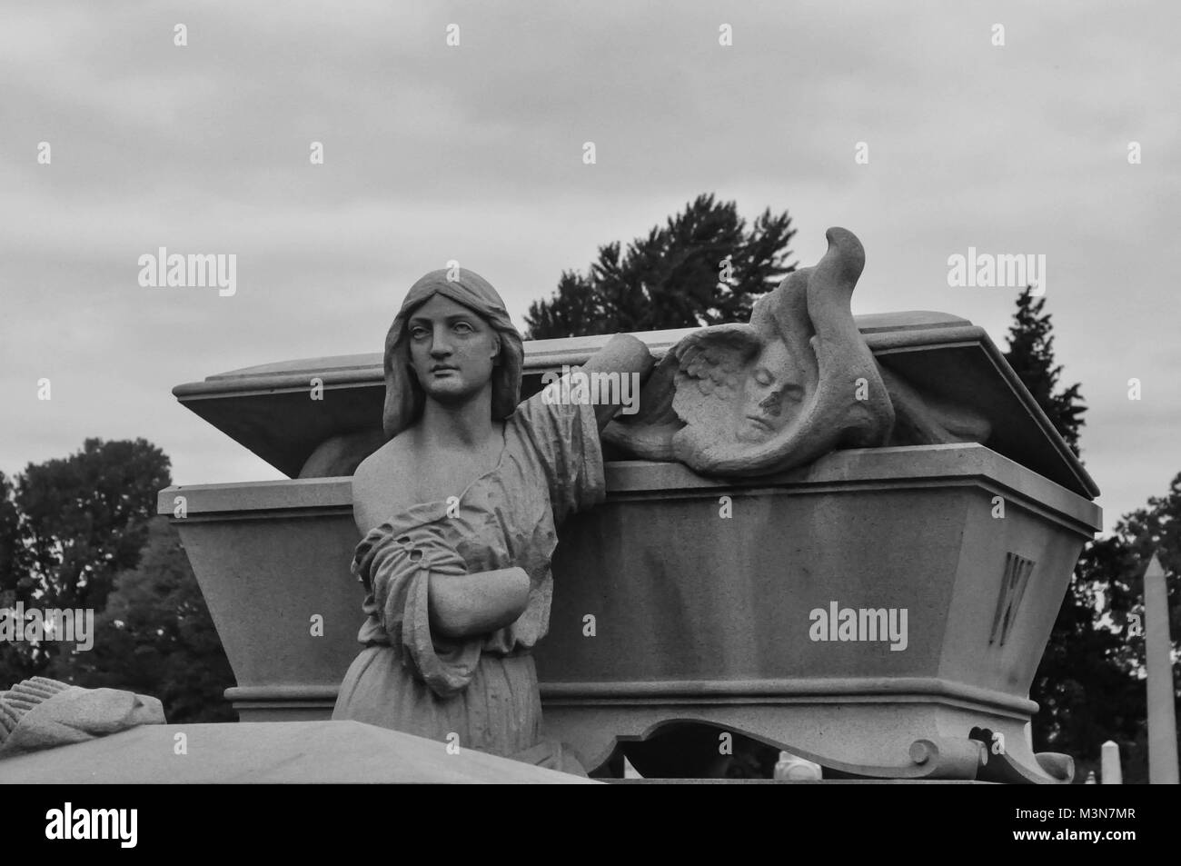 Statue of mourning mother Black and White Stock Photos & Images - Alamy