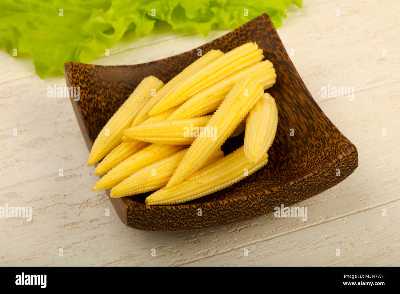 Young raw baby corn Stock Photo - Alamy