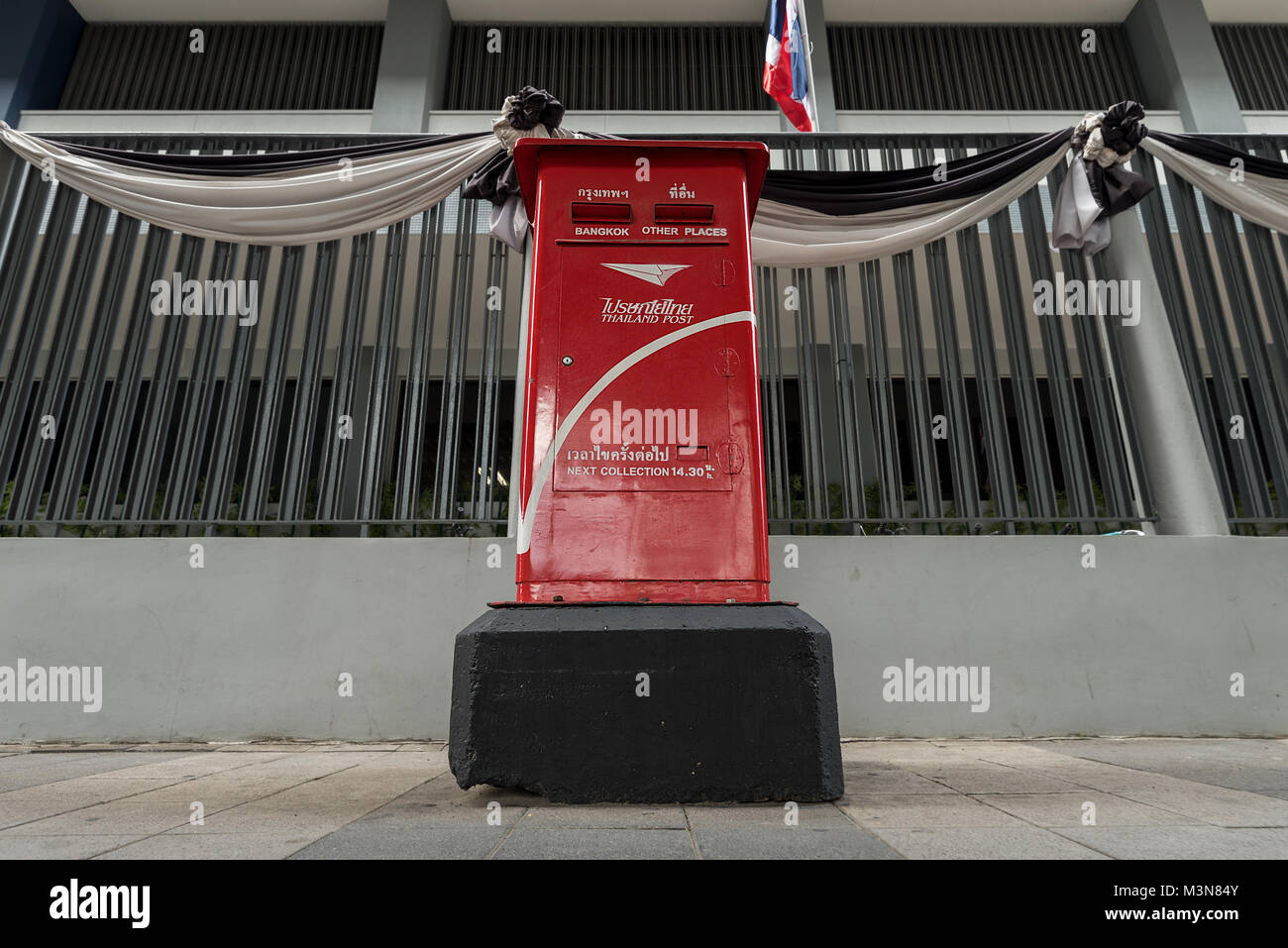 City street view of a Bangkok located Thailand Post red post box with ...
