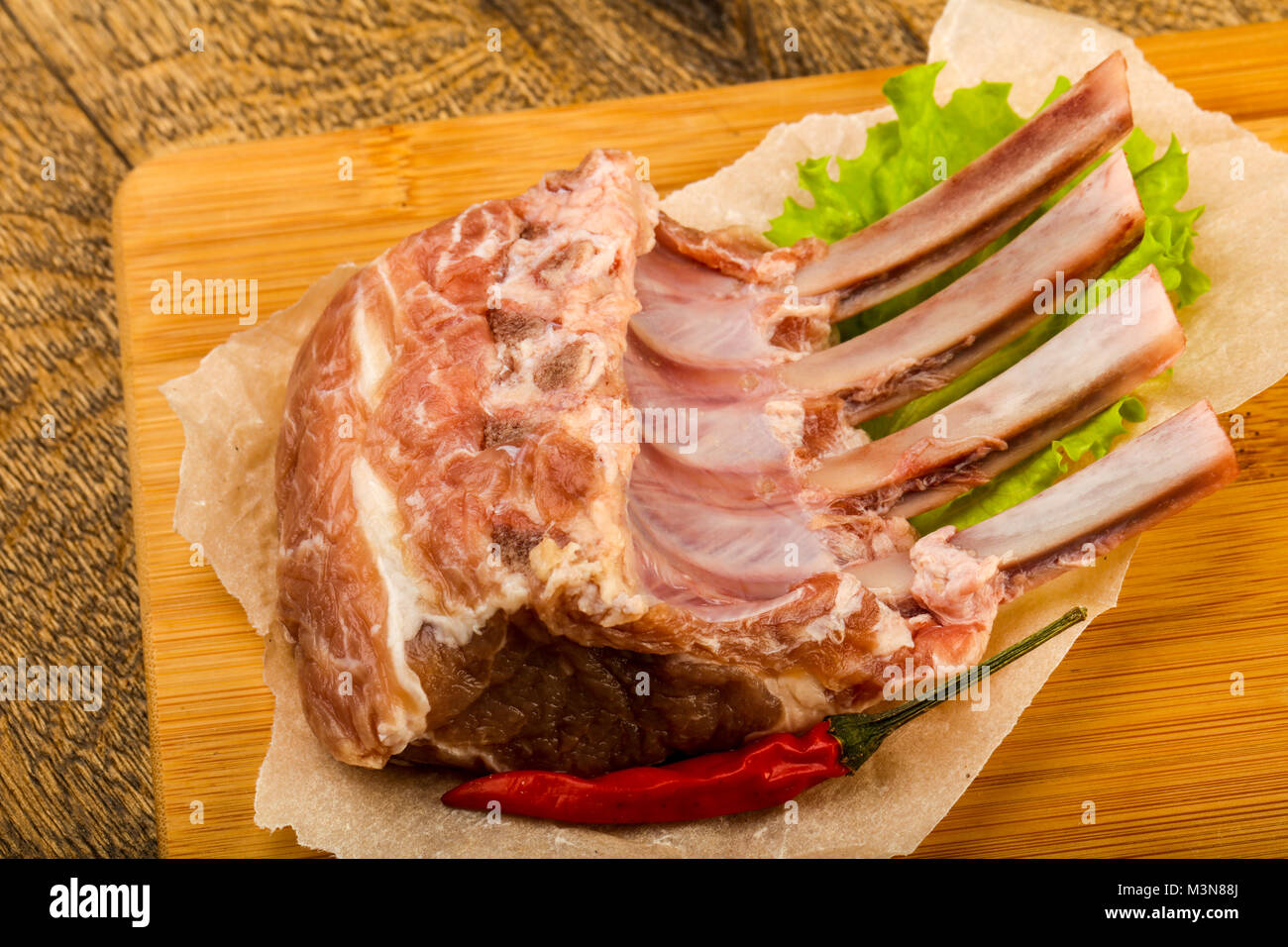 Raw lamb ribs with pepper ready for cooking Stock Photo - Alamy