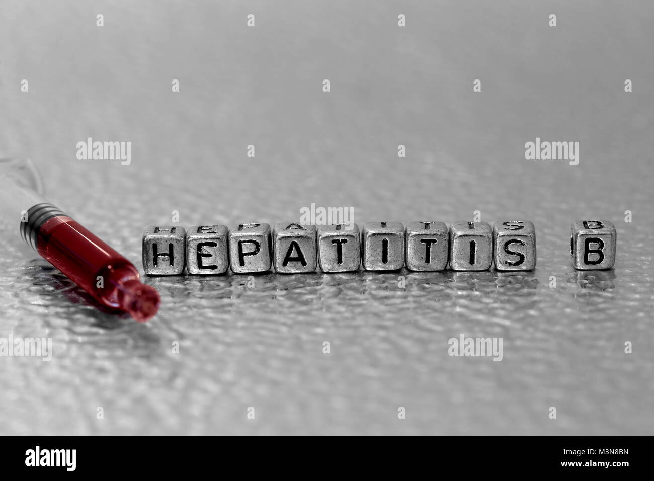 Hepatitis B on beads with blood in a syringe Stock Photo - Alamy
