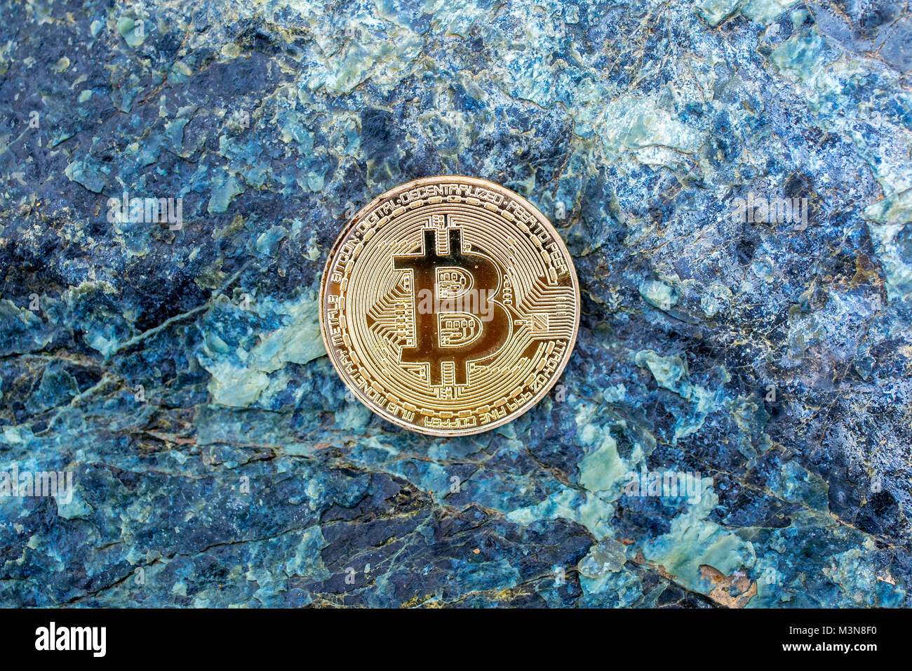 bitcoin on the stone background Stock Photo - Alamy