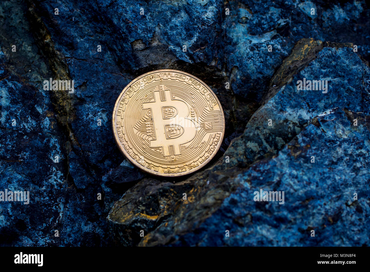 bitcoin on the stone background Stock Photo - Alamy