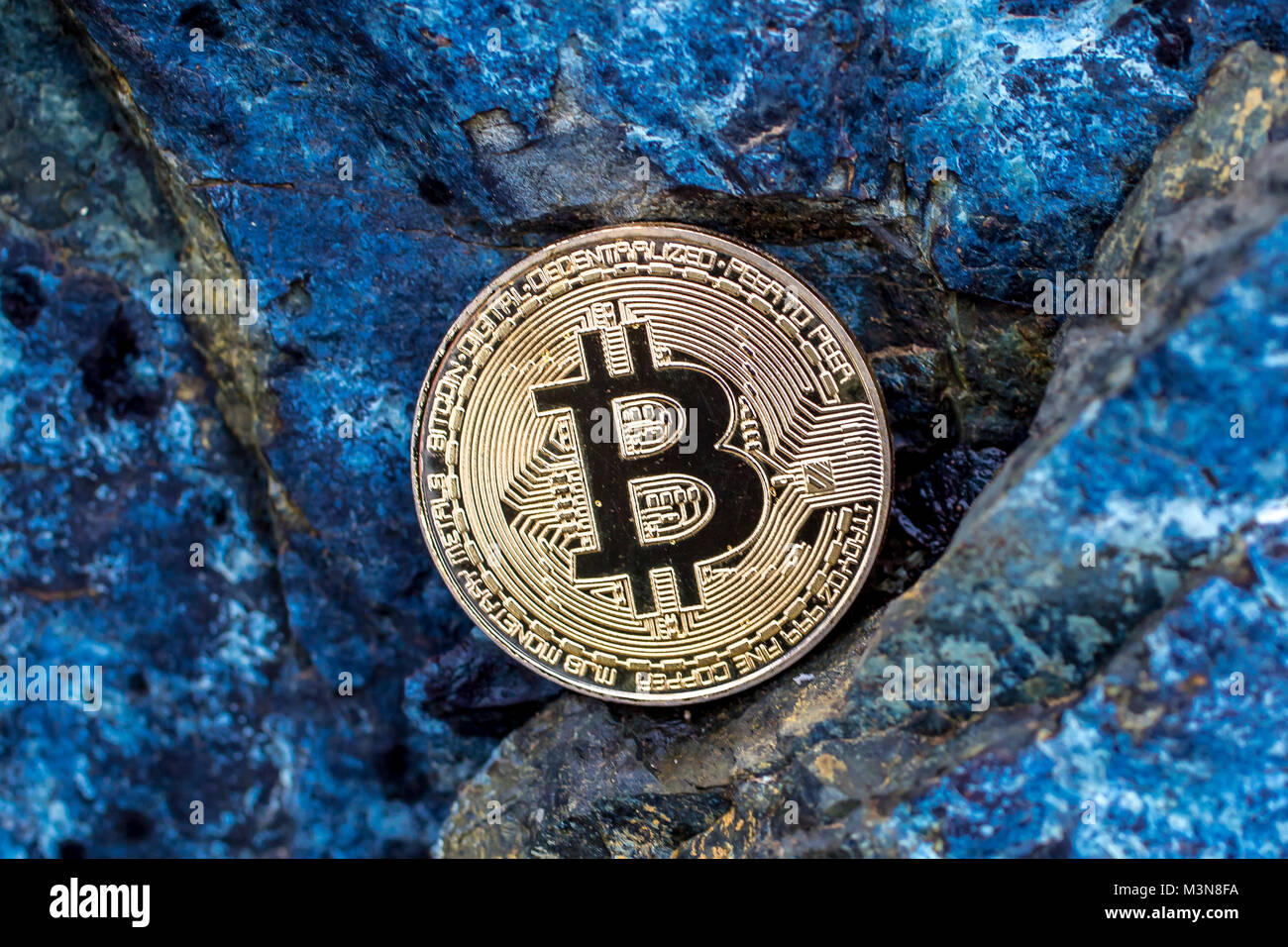 bitcoin on the stone background Stock Photo - Alamy