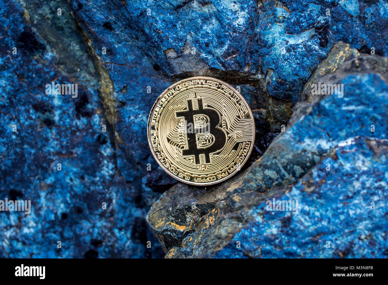 bitcoin on the stone background Stock Photo - Alamy