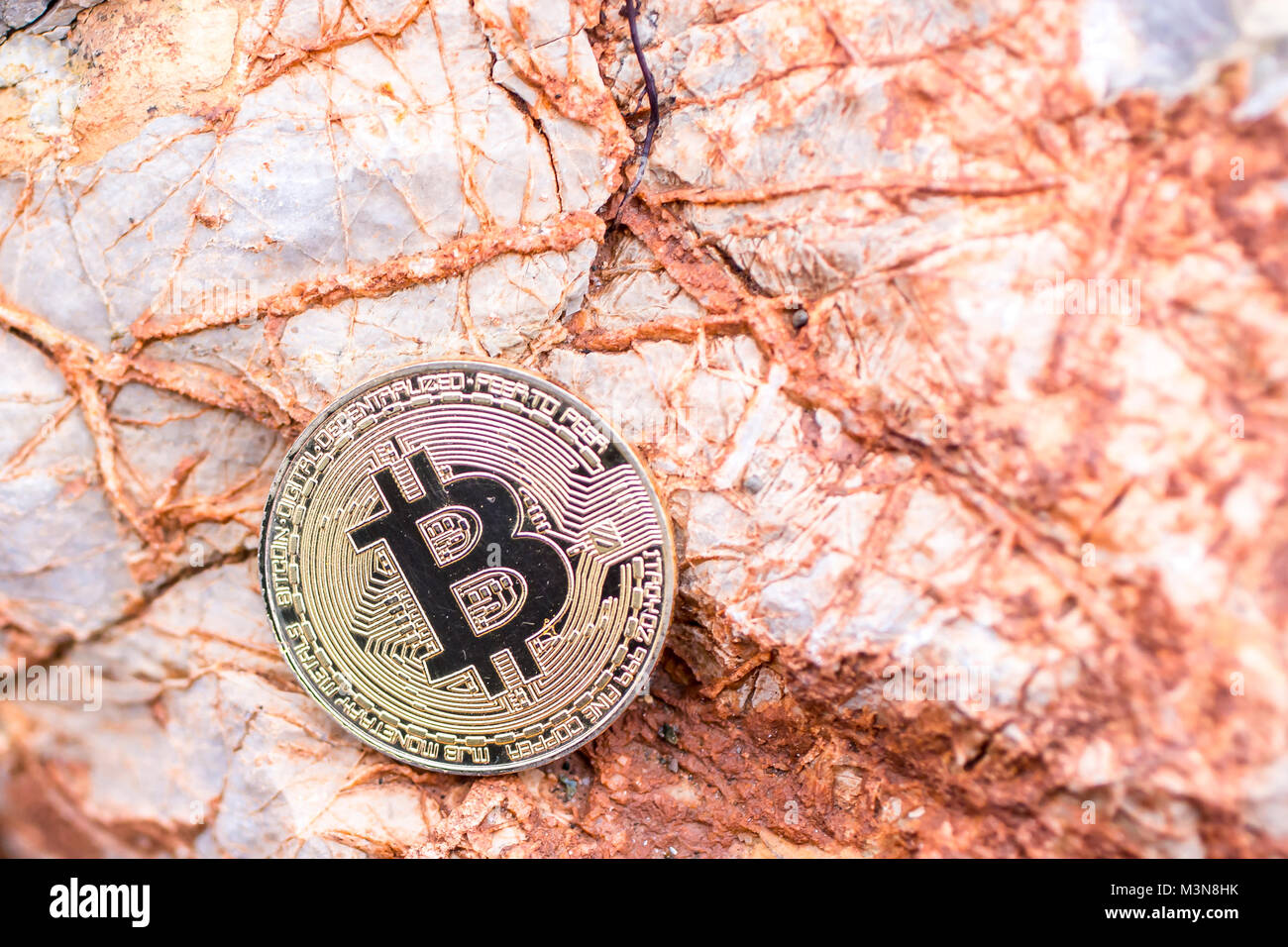bitcoin on the stone background Stock Photo - Alamy